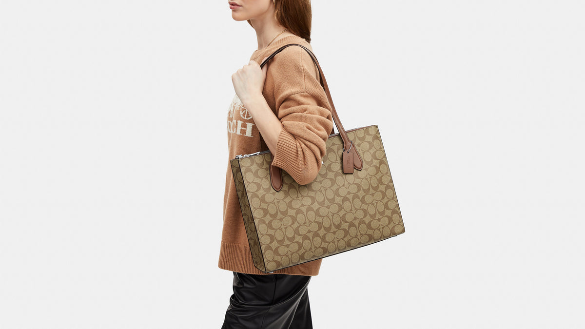 Coach- Nina Carryall In Signature Canvas – Amreki